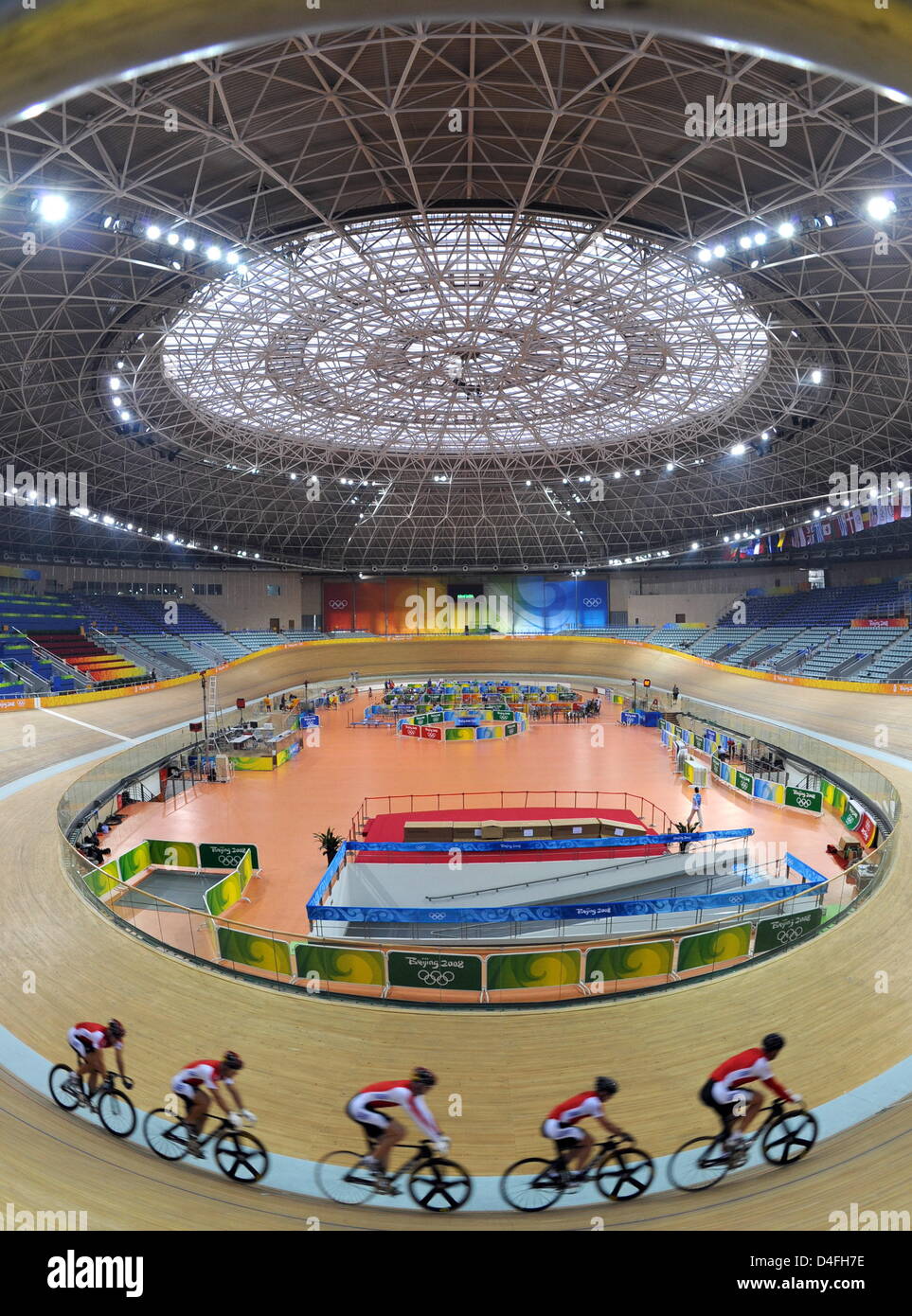 The German track cycling team exercises in the Laoshan Velodrome in ...