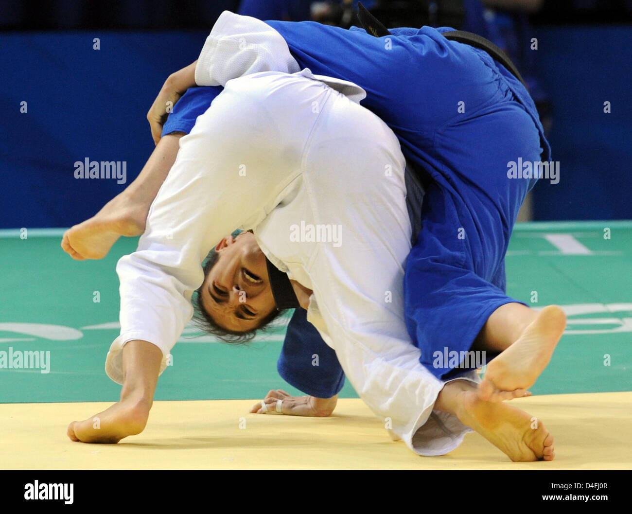 Michaela Baschin (R) of Germany competes against Meriem Moussa of ...