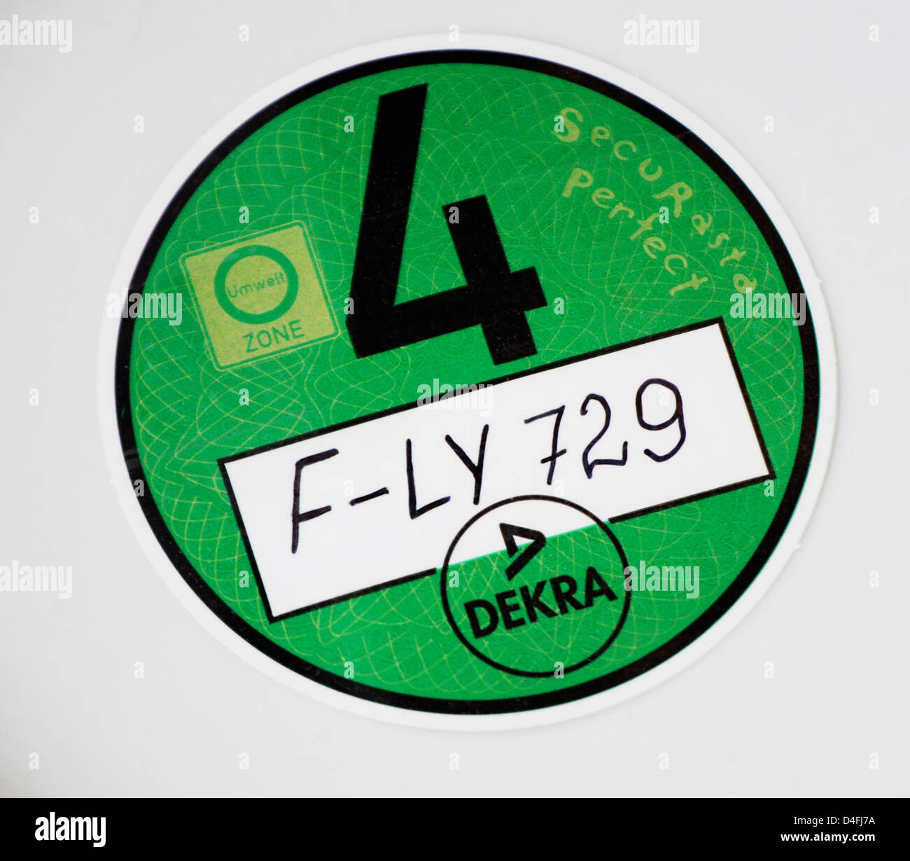 A green pollution badge, clearing cars to access downtown areas ...