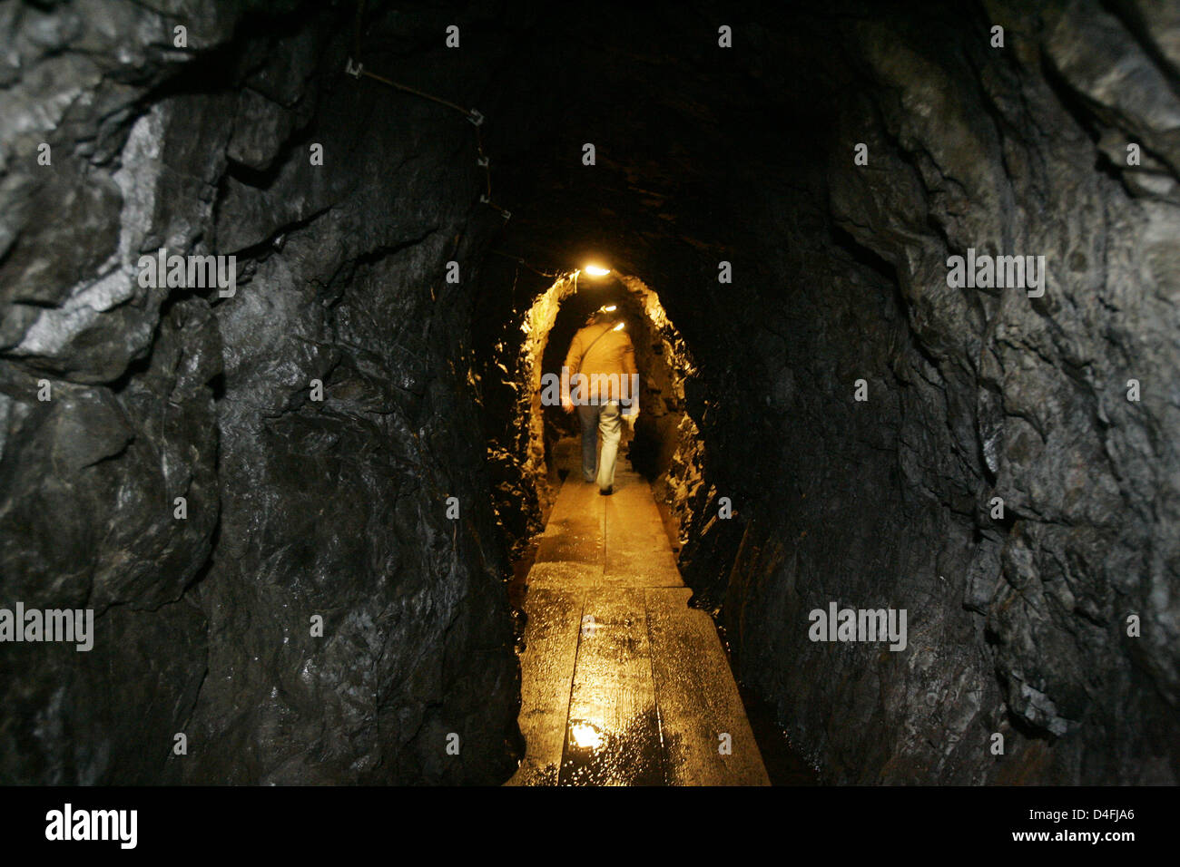 Visitors to the mine museum 'Grube Samson' pictured in a gallery in ...