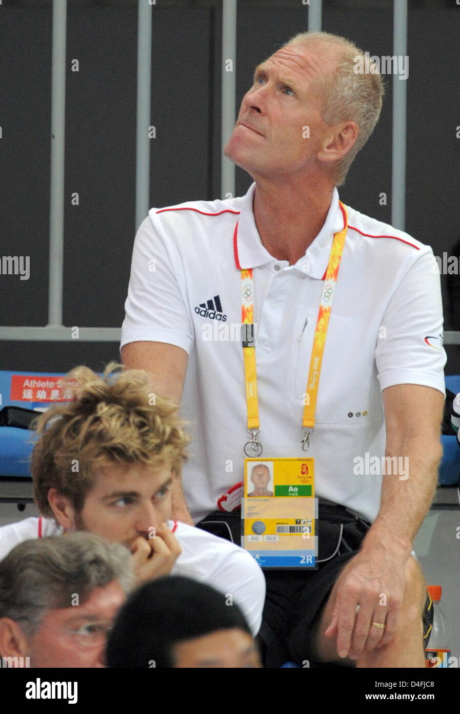 German head coach Oerjan Madsen (top) and German swimmer Helge Meeuw ...