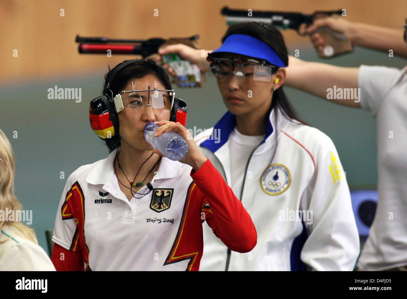 German Munkhbayar Dorjsuren drinks from bottle during the women`s 10m ...