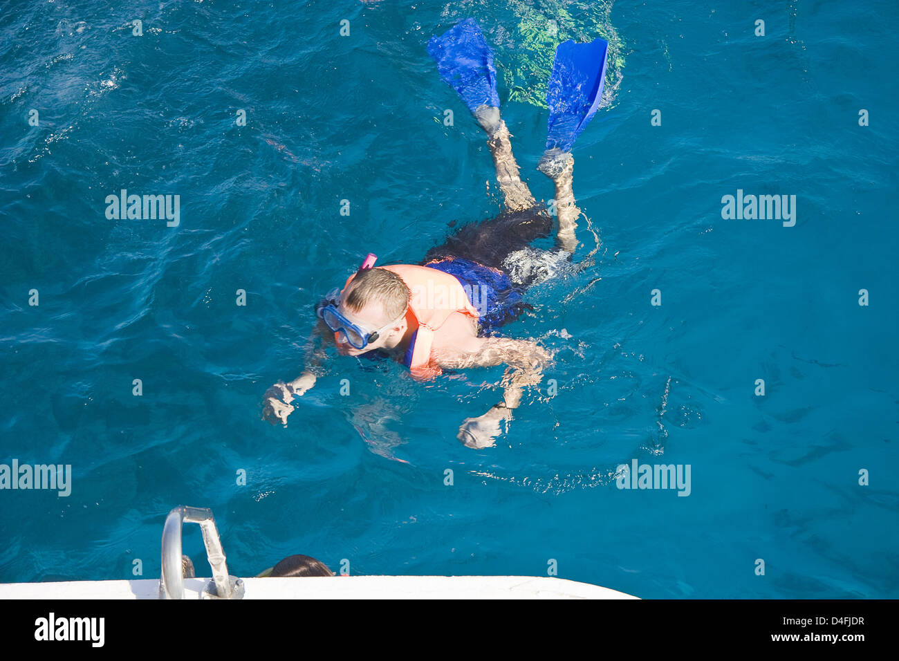 Young man swimming in the sea Stock Photo - Alamy