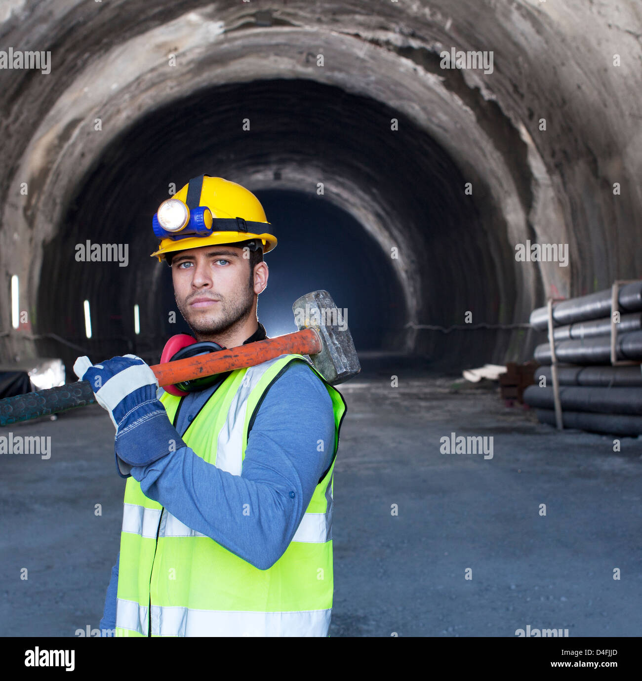 Construction worker carrying pipe hi-res stock photography and images ...