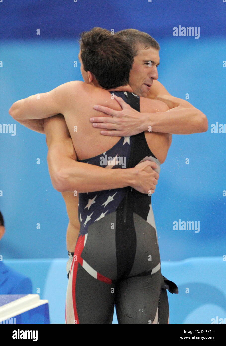 US swimmers Michael Phleps (back) and Garrett Weber-Gale hug after ...