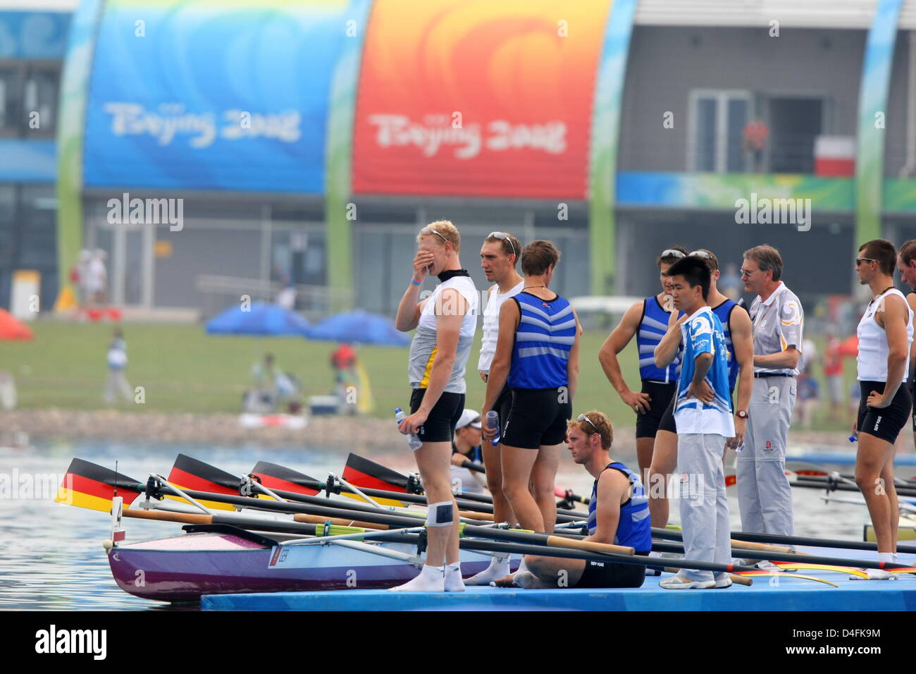 The Team of German Men`s Eight stand after heat 1 men`s eight on a ...
