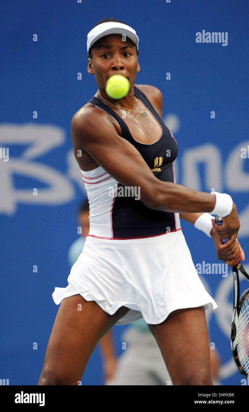 Venus Williams of US returns a shot of Bacsinsky of Switzerland during ...