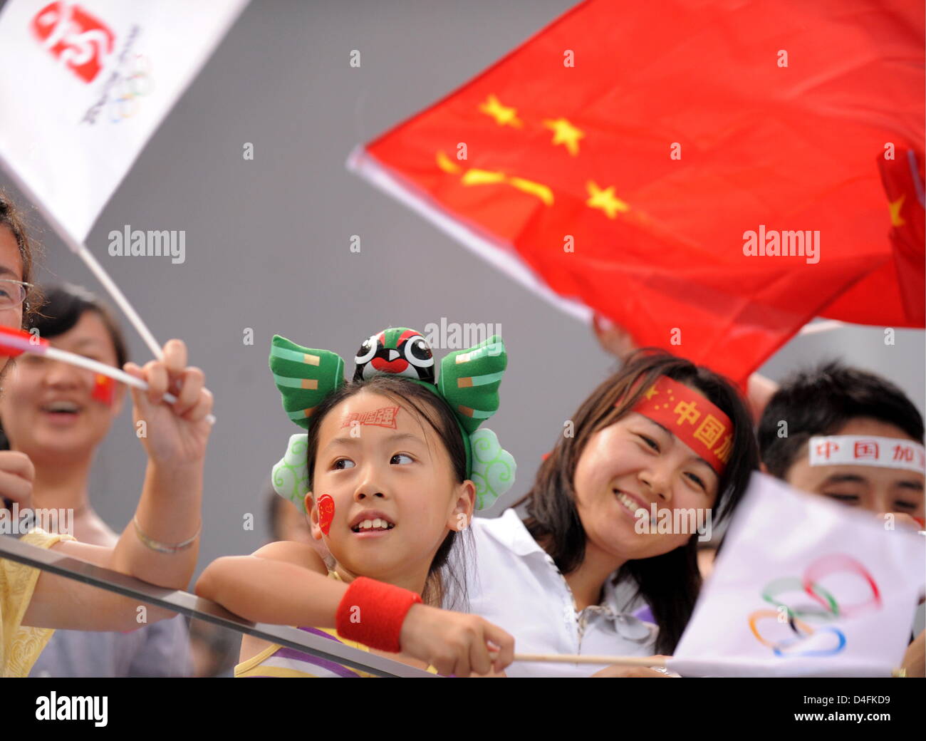 A young chinese supporter at the diving during the women's Sync. 3m ...