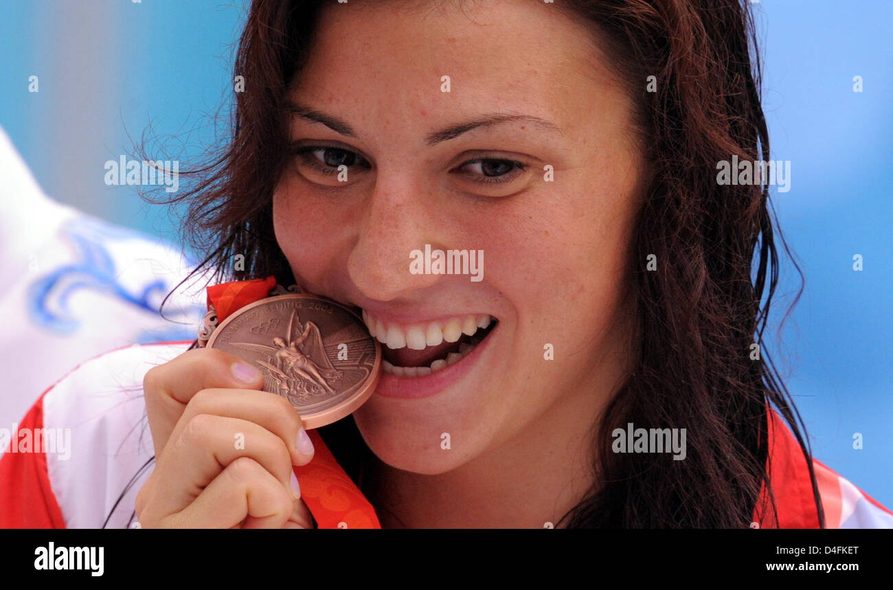 Mirna Jukic from Austria shows her bronze medal after the women's 100m ...