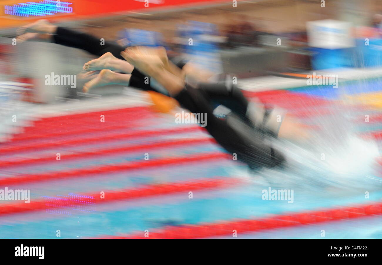 The start of the men's 4X200m freestyle relay final during the swimming ...