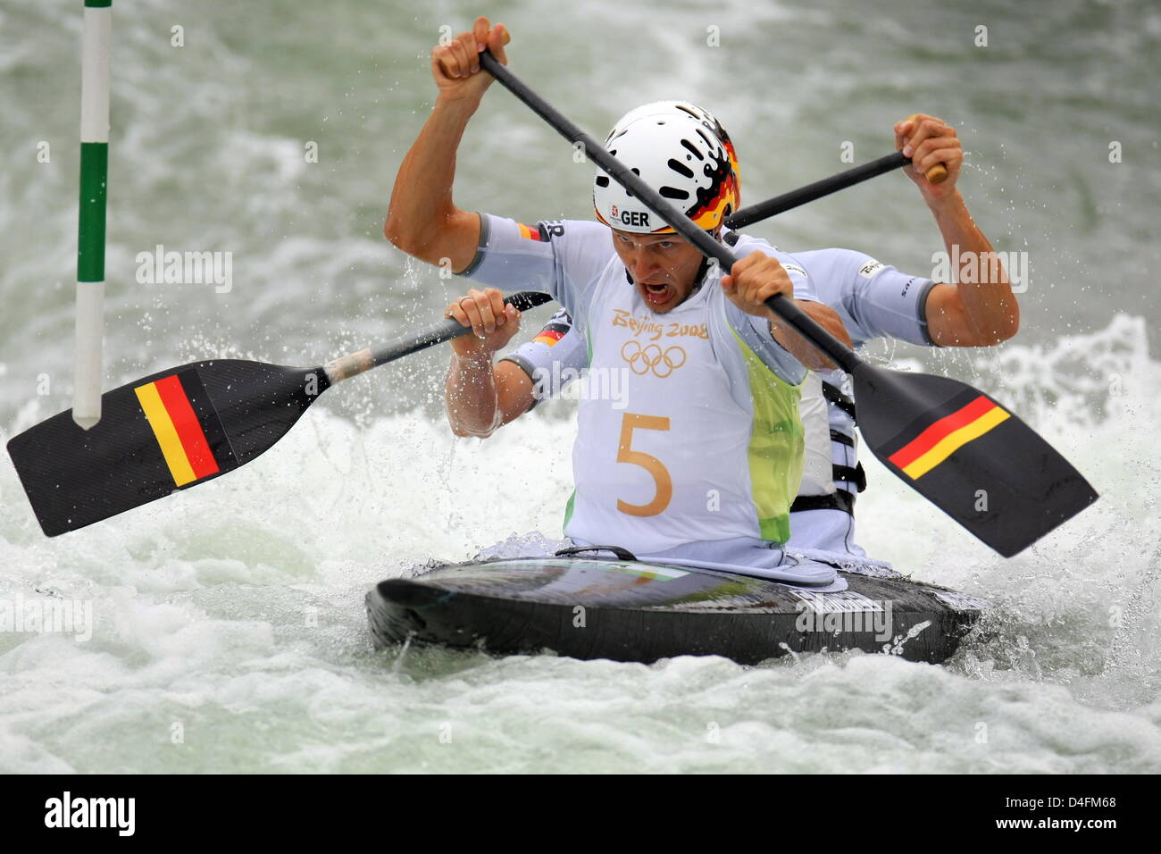 Felix Michel (front) and Sebastian Piersig of Germany paddel in the ...