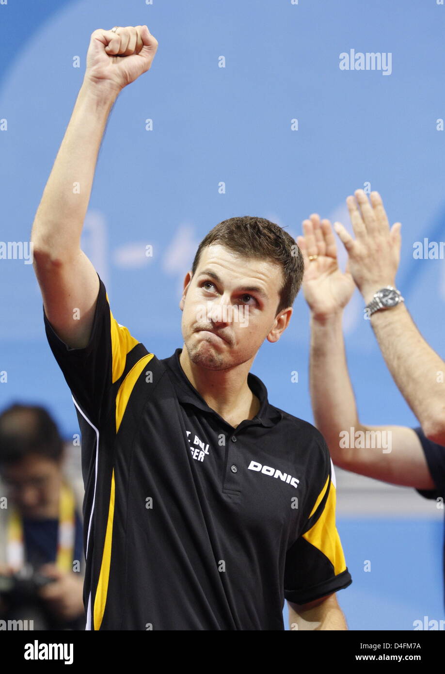 Timo Boll of Germany celebrates the victory after the menÒs team table ...