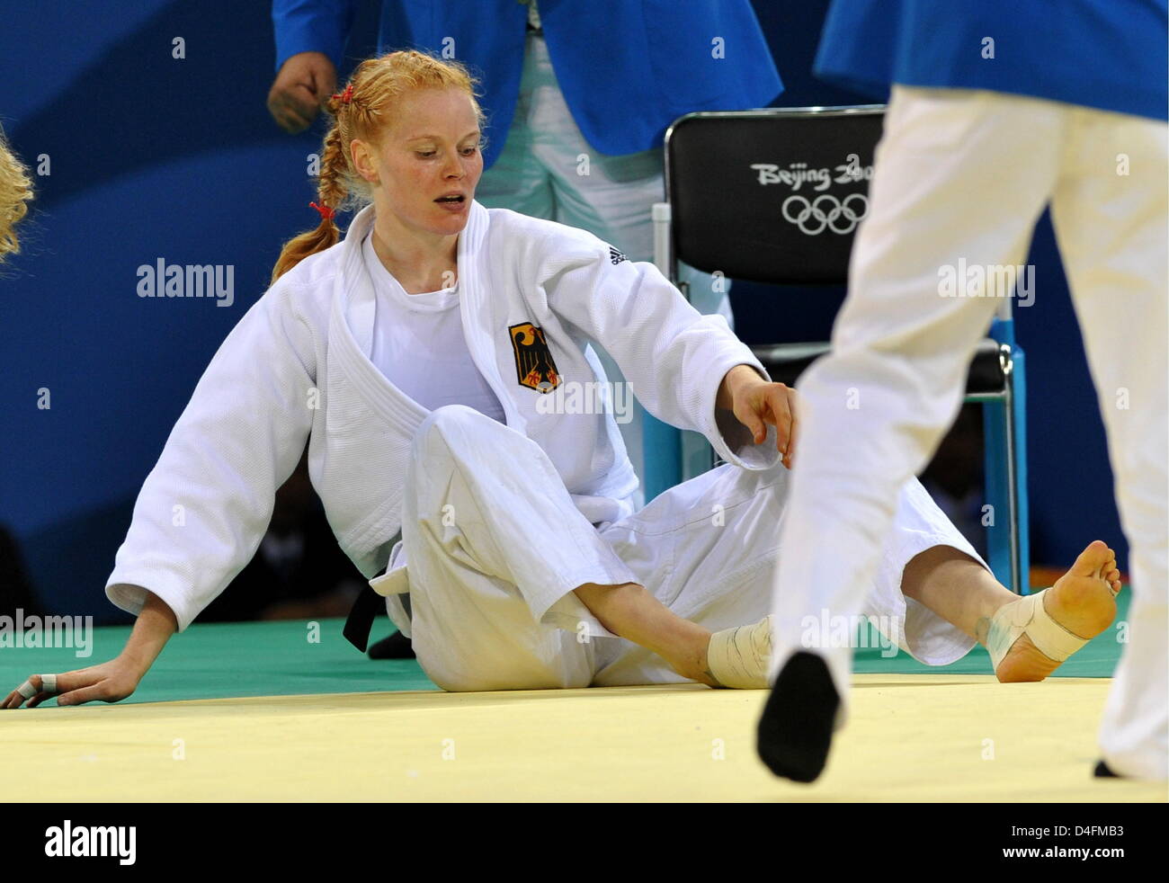 Annett Boehm (white) of Germany loses the bronze medal fight against ...