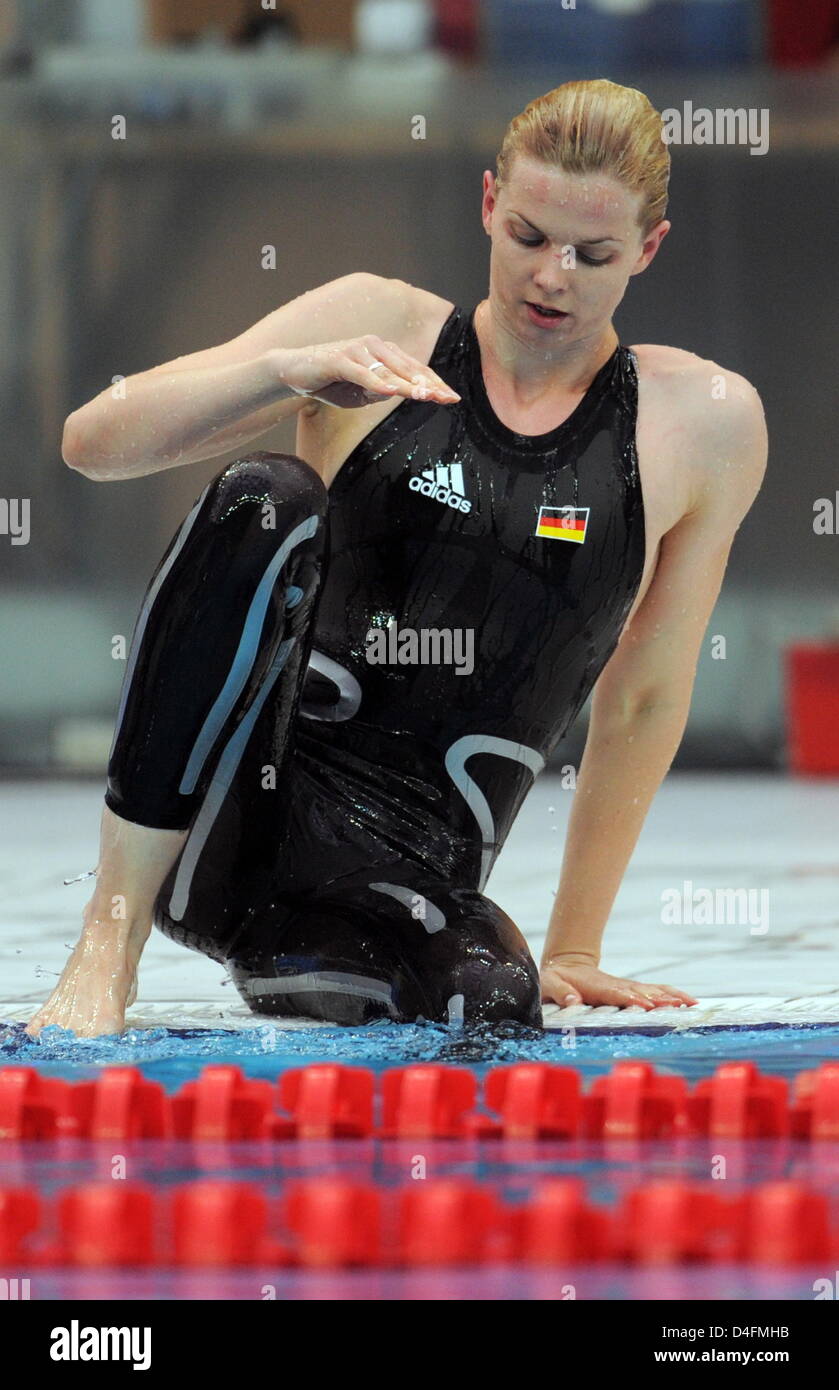 Britta Steffen of Germany reacts after the women's 100m freestyle ...