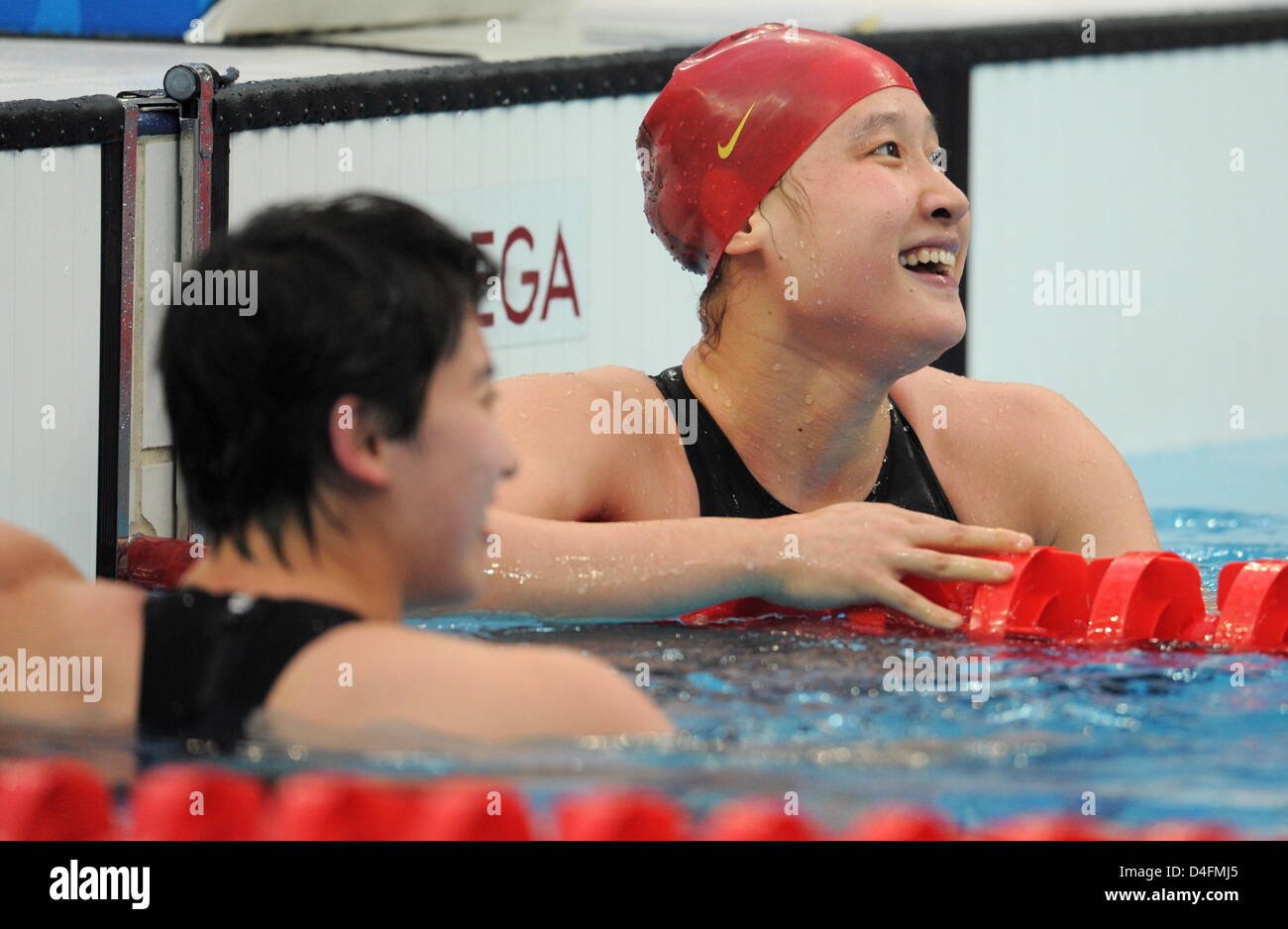 Liu Zige (R) of China celebrates with team mate Liuyang Jiao in the ...
