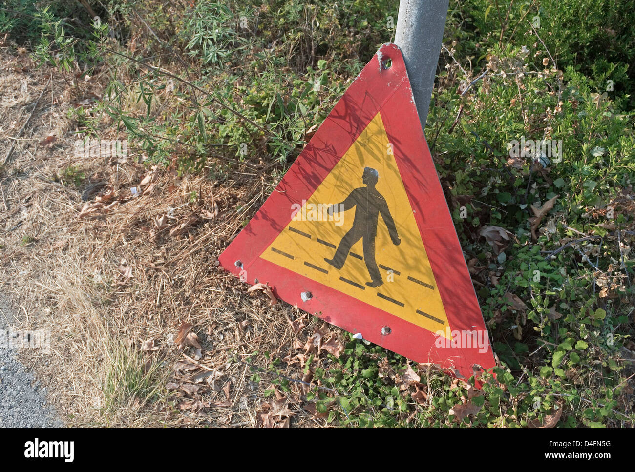 Pedestrian crossing sign on ground Stock Photo - Alamy
