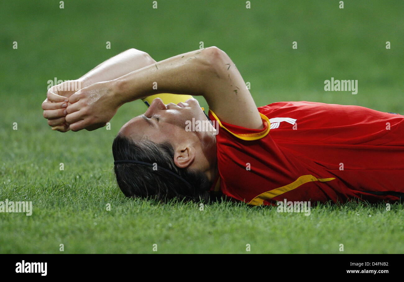 Birgit Prinz of Germany lies on the pitch during the Women's football ...