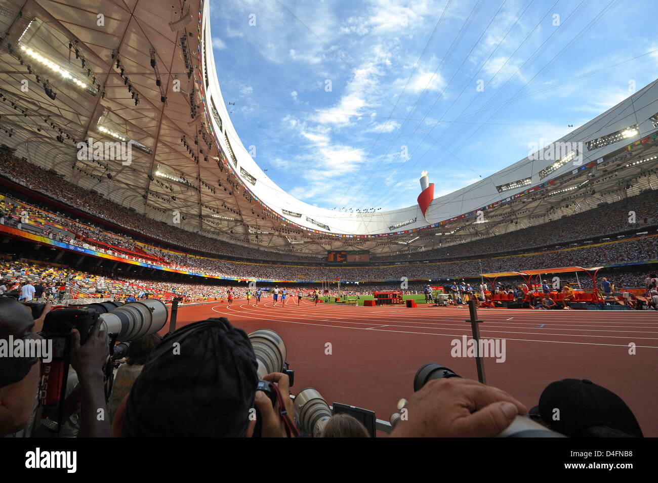 Photographers are pictured during the Athletics events in the National ...