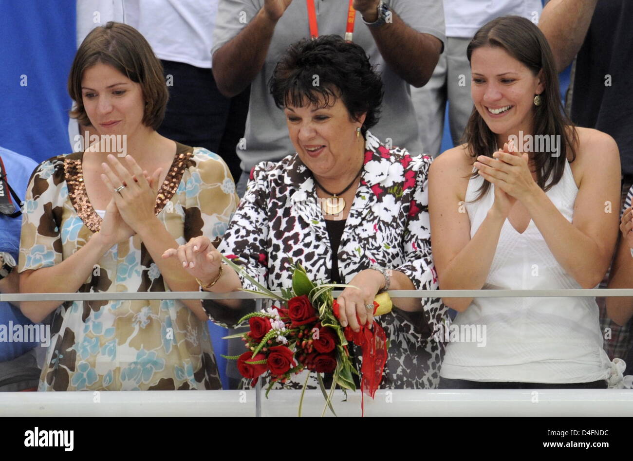 Deborah Phelps (C), Mother of Michael Phelps from the USA, waves to her ...