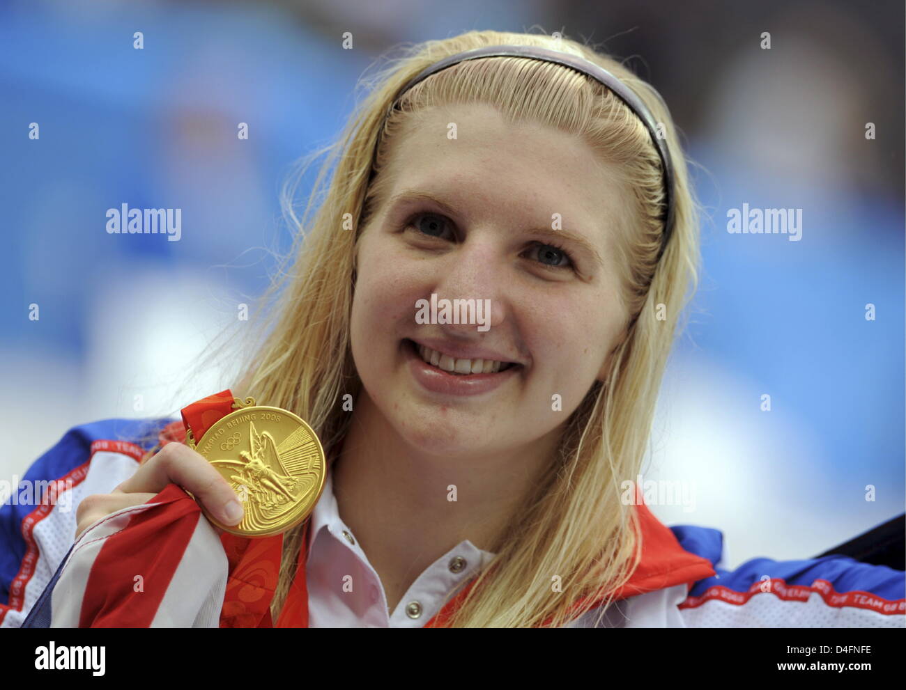 Rebecca Adlington Of Great Britain Shows Her Gold Medal After Winning