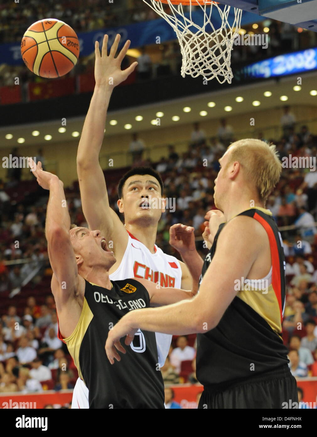 Konrad Christoph Wysocki (L) and Christopher Kaman of Germany vie with ...