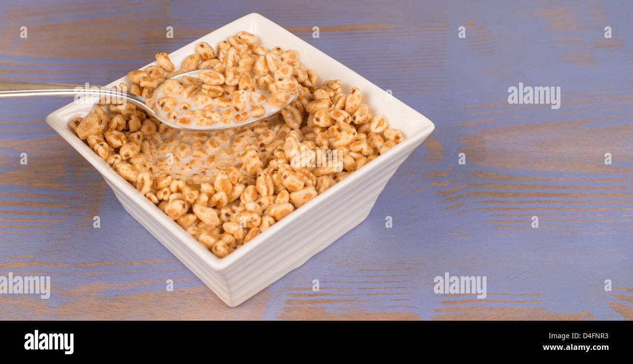 Bowl of puffed rice served with fresh milk Stock Photo - Alamy