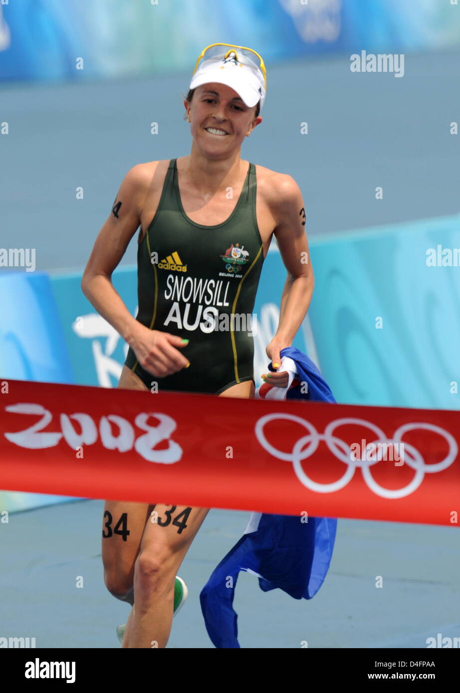 Emma Snowsill of Australia wins the women`s Triathlon final at the Ming ...