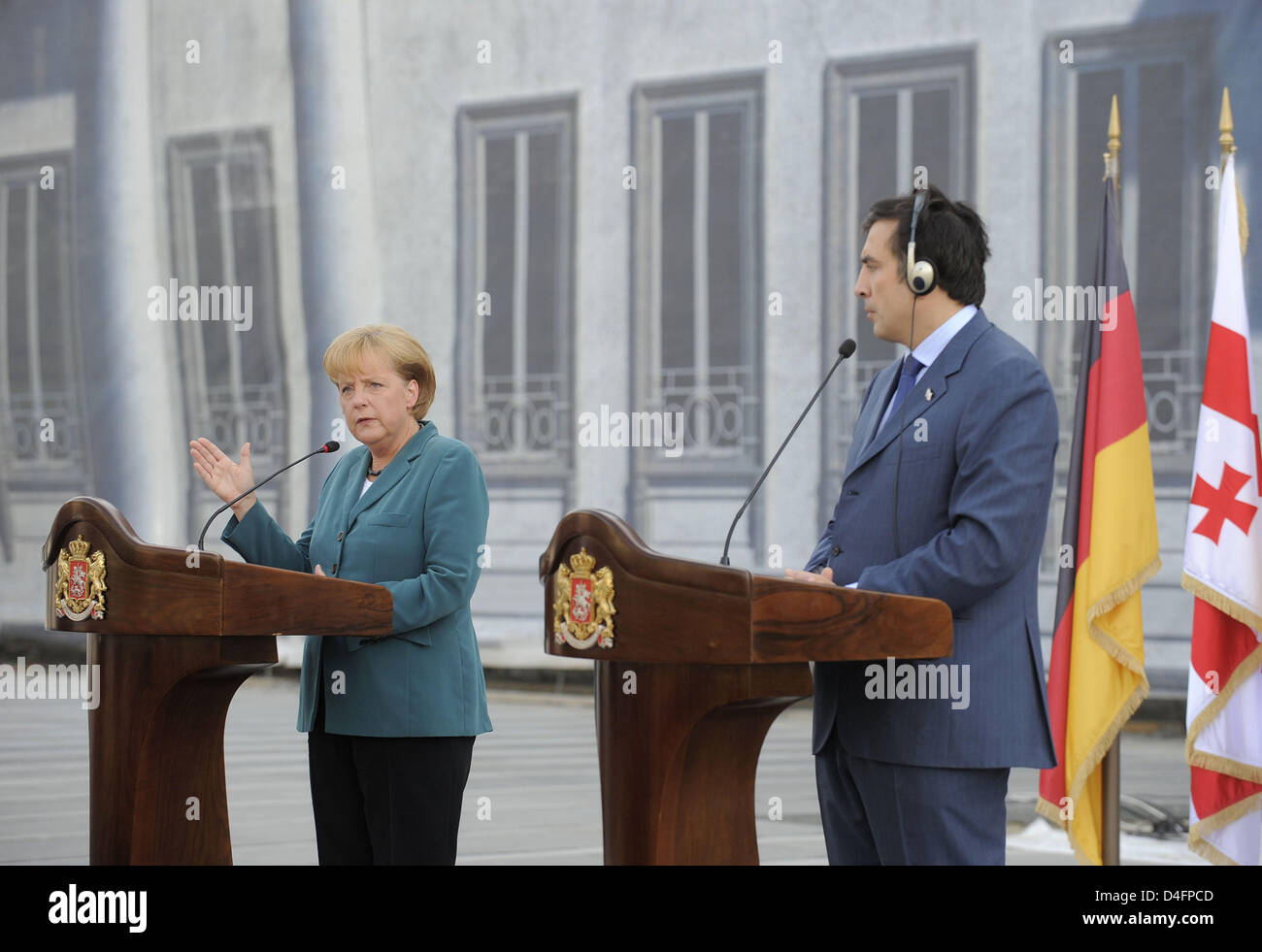German Chancellor Angela Merkel and Georgian President Micheil ...