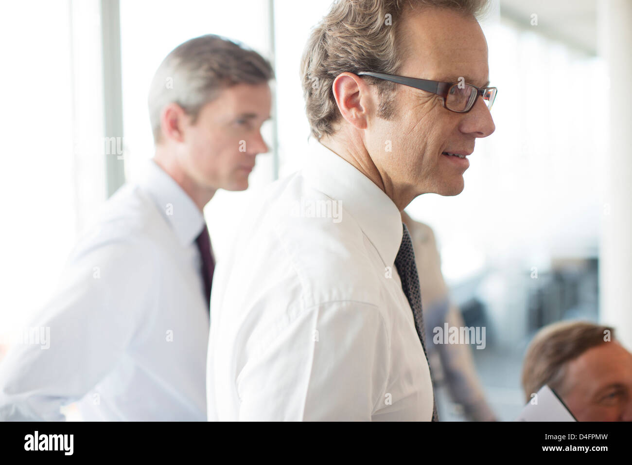 Businessmen talking in meeting Stock Photo - Alamy