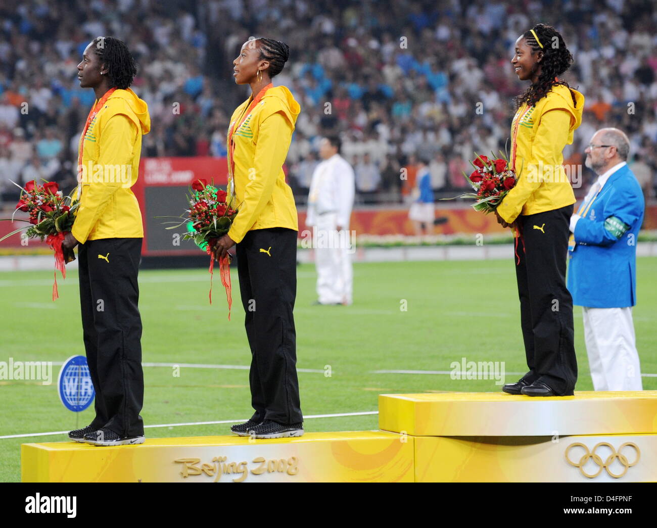 Jamaican gold winner Shelly-Ann Fraser (R), Jamaican Sherone Simpson (C ...