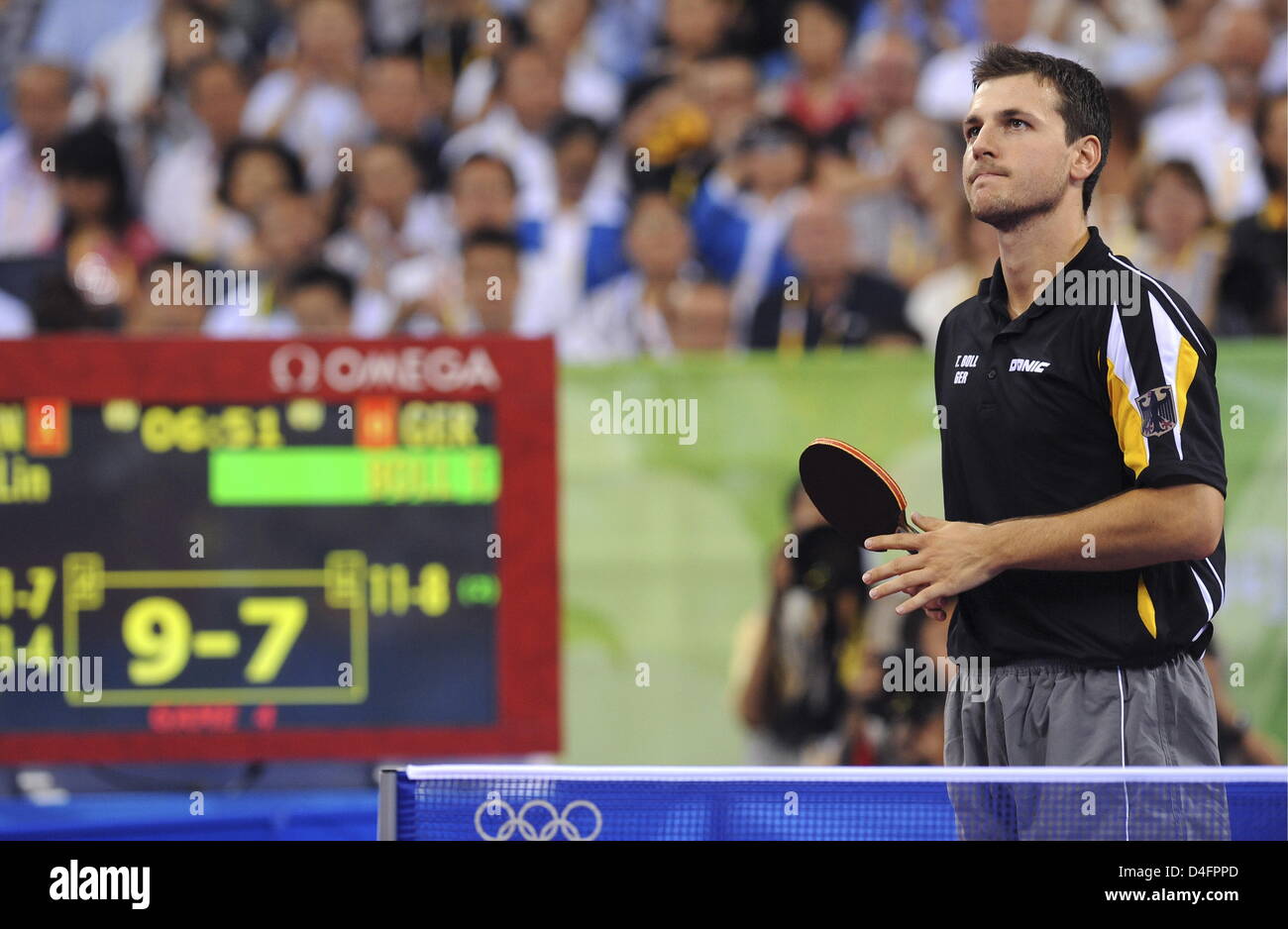 Timo Boll from Germany looks dejected during the Men's Team Gold Medal ...