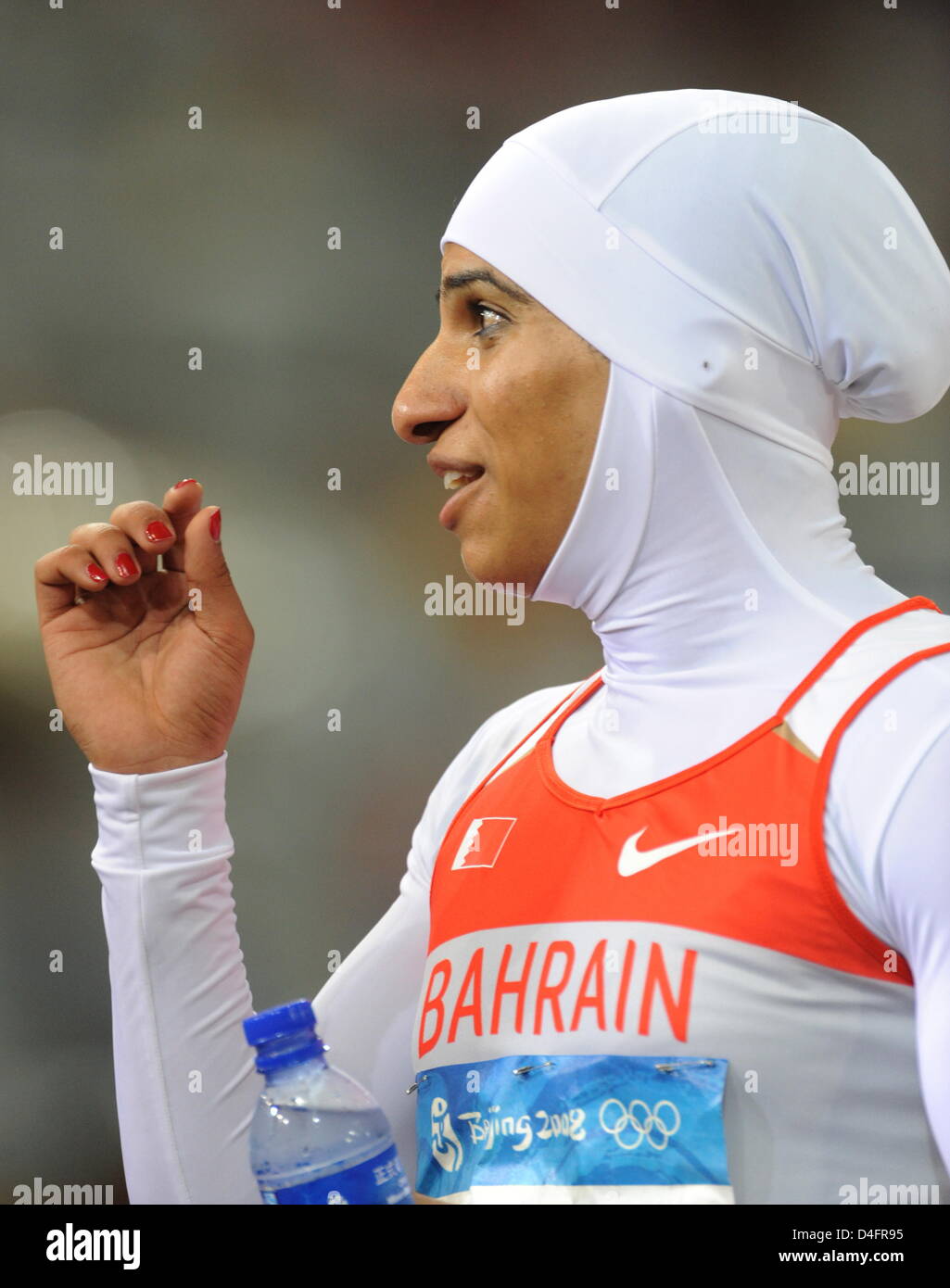 Rogaya Al Gassra of Bahrain competes in the Women's 200m heat at the ...