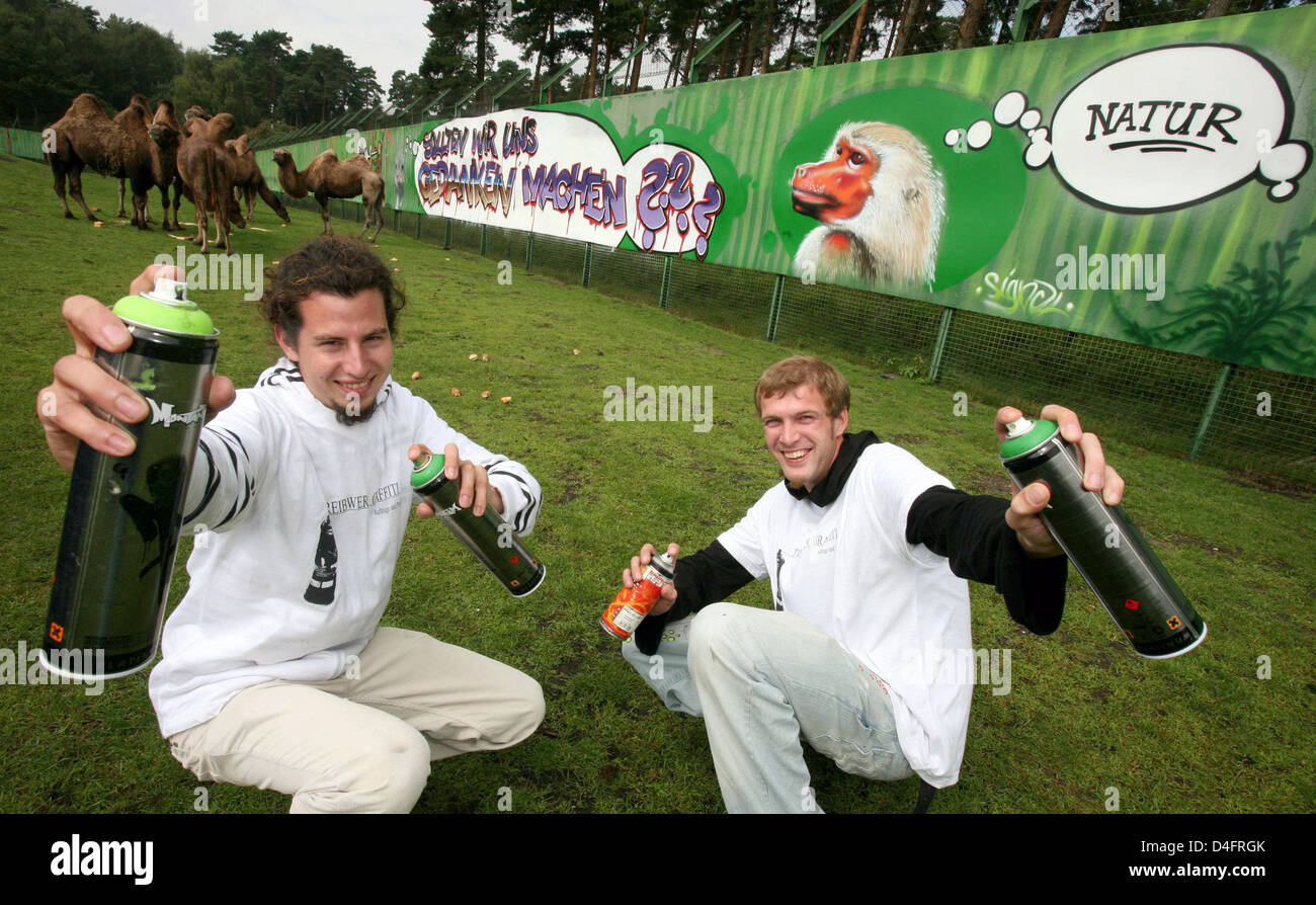 Graffiti artists Bastian Morbe and Lasse Markrickas (R) pose in front ...