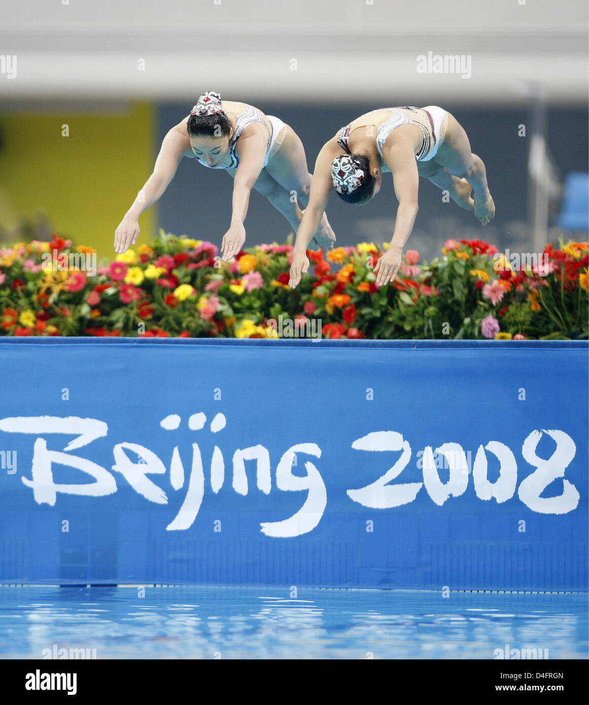 Tingting Jiang and Wenwen Jiang of China exercise in the Duet Free Routine - Final of the ...