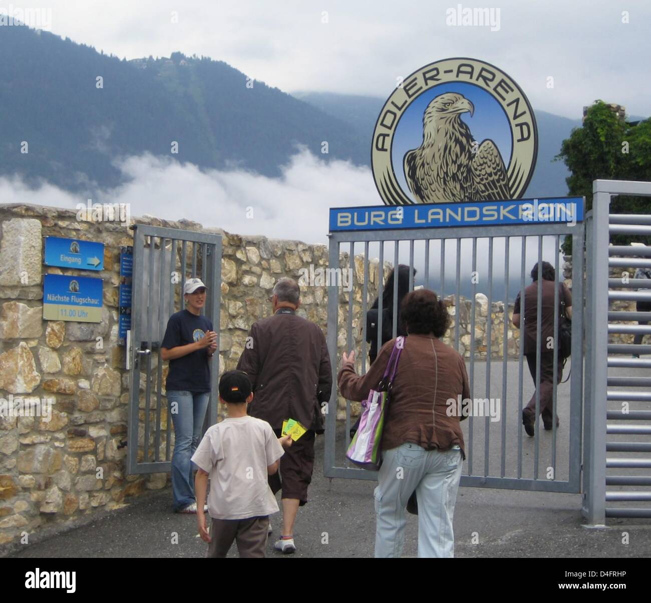 Visitors arrive at the entrance of the 'Adler-Arena' of Castle ...