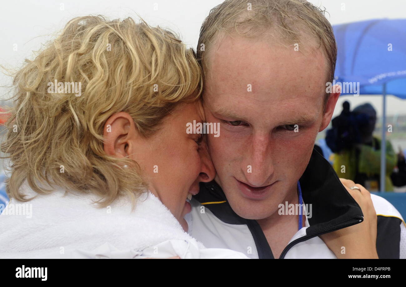 Thomas Lurz (R) of Germany celebrates with his sister in law Annika ...