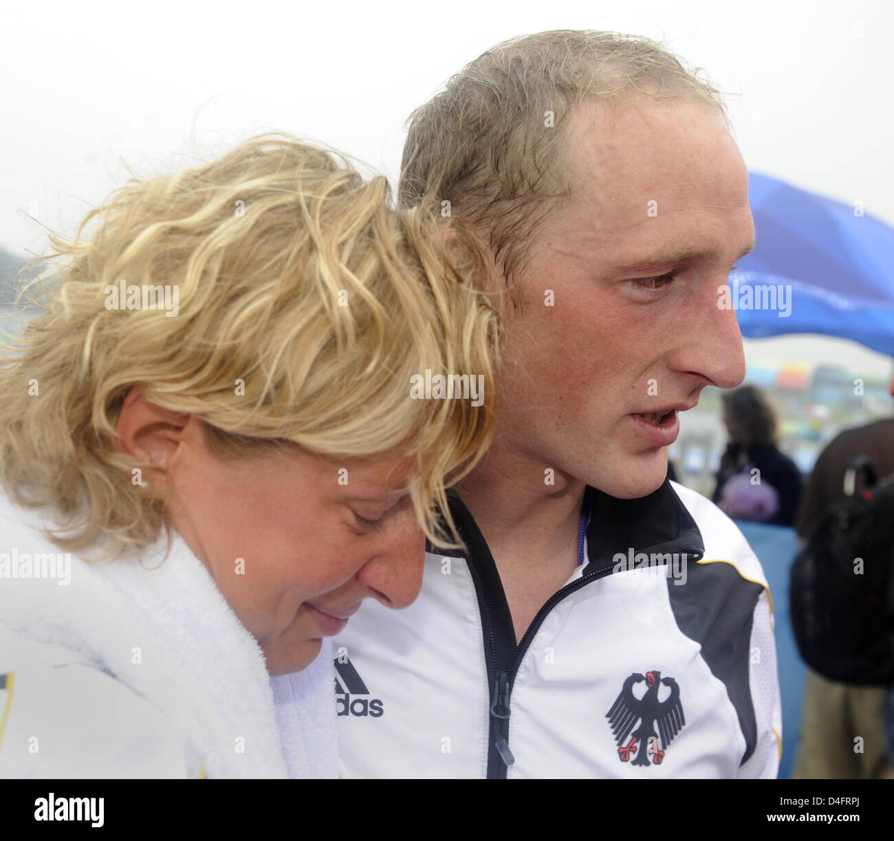 Thomas Lurz (R) of Germany celebrates with his sister in law Annika ...