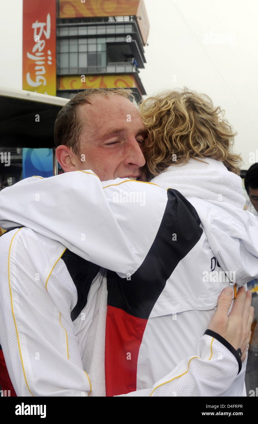Thomas Lurz (L) of Germany celebrates with his sister in law Annika ...