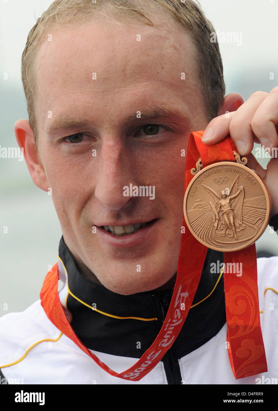 Thomas Lurz of Germany celebrates with his bronze medal after the Men's ...