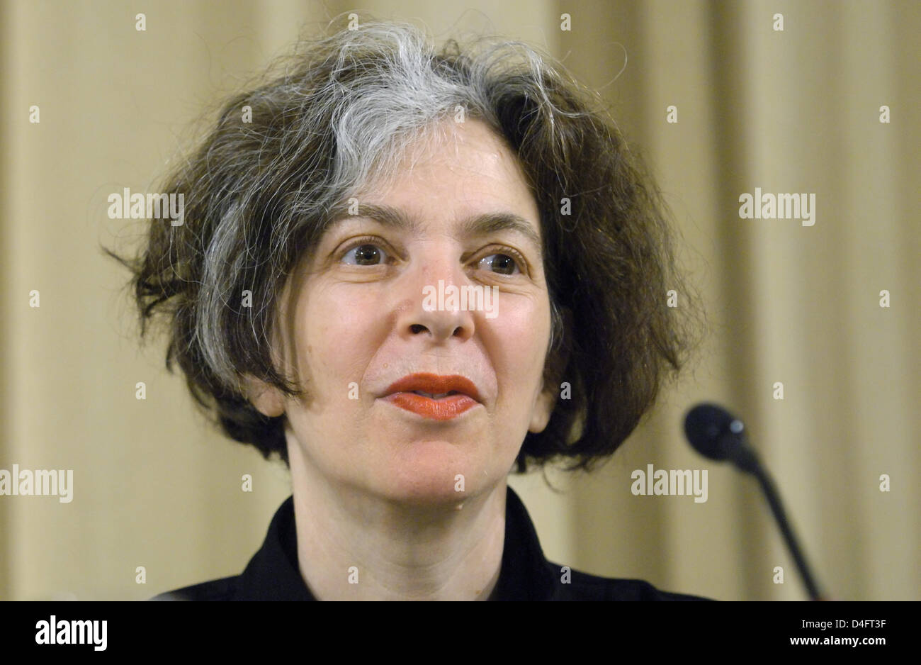 US artist Barbara Bloom captured with some of the exhibits of the ...