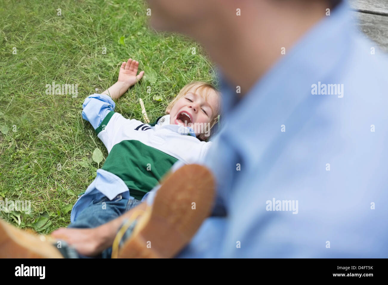 Father and son playing outdoors Stock Photo - Alamy Father and son playing outdoors Stock Photo - Alamy