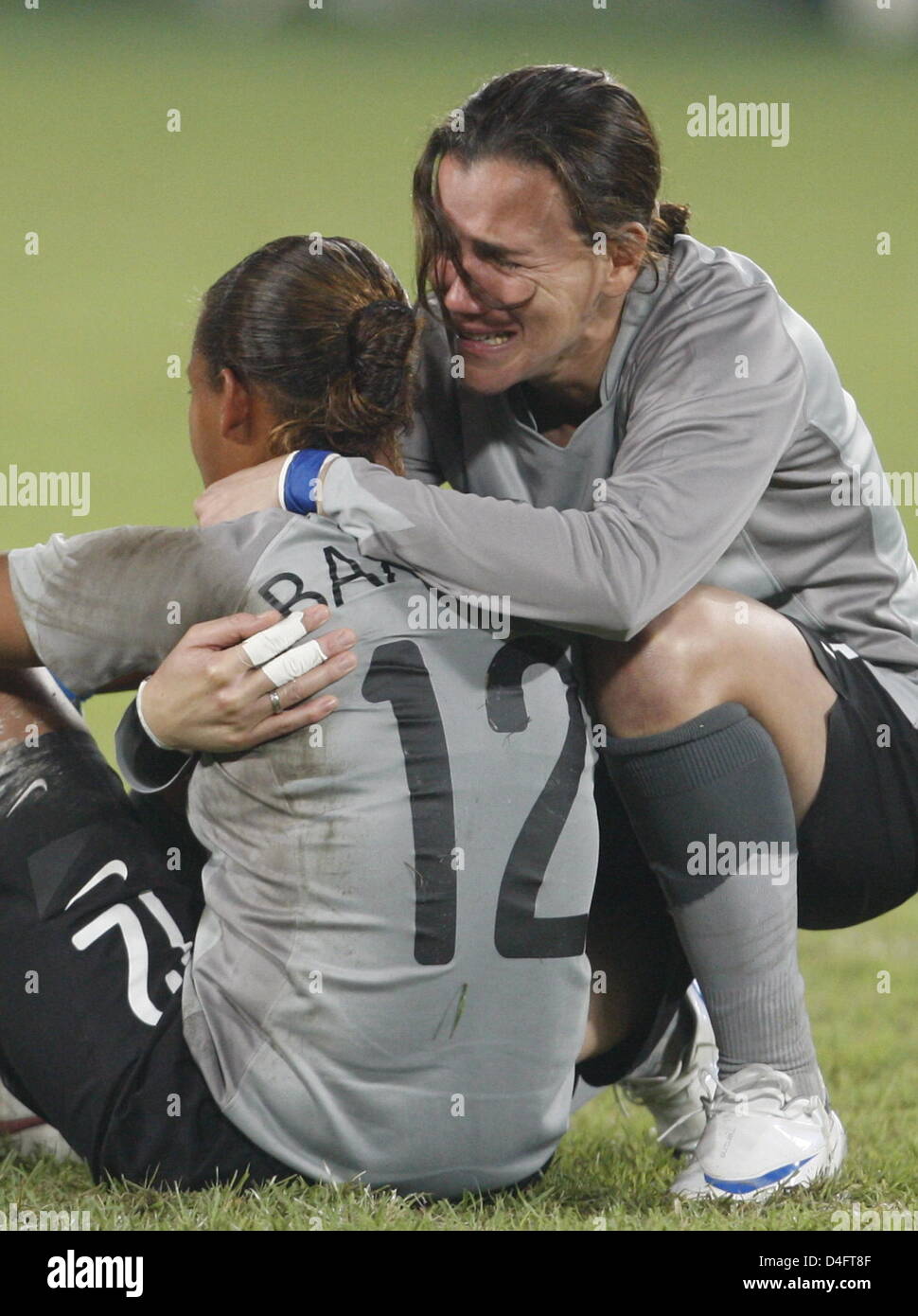 Goalkeepers Barbara (L) and Andreia of Brazil cry after the US women's ...