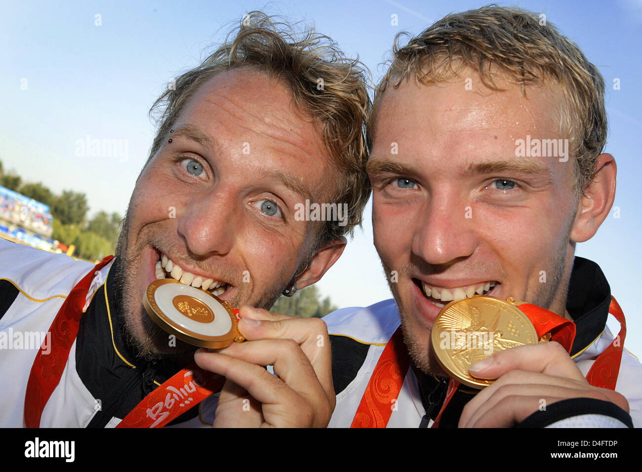 Andreas Ihle (L) and Martin Hollstein of Germany celebrate their Gold ...