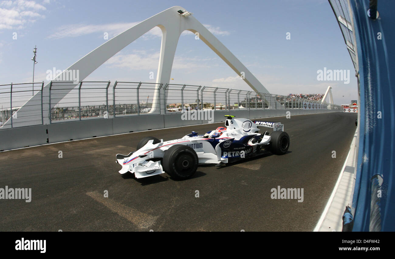 Polish Formula One driver Robert Kubica of BMW Sauber steers his car ...
