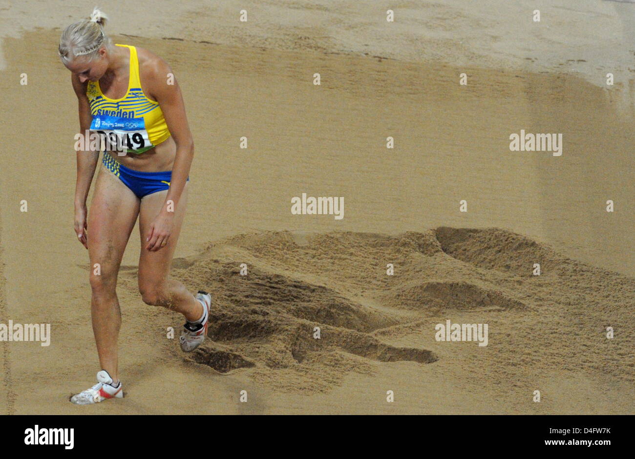 Carolina Klueft looks dejected when she leaves the pit during the Women ...