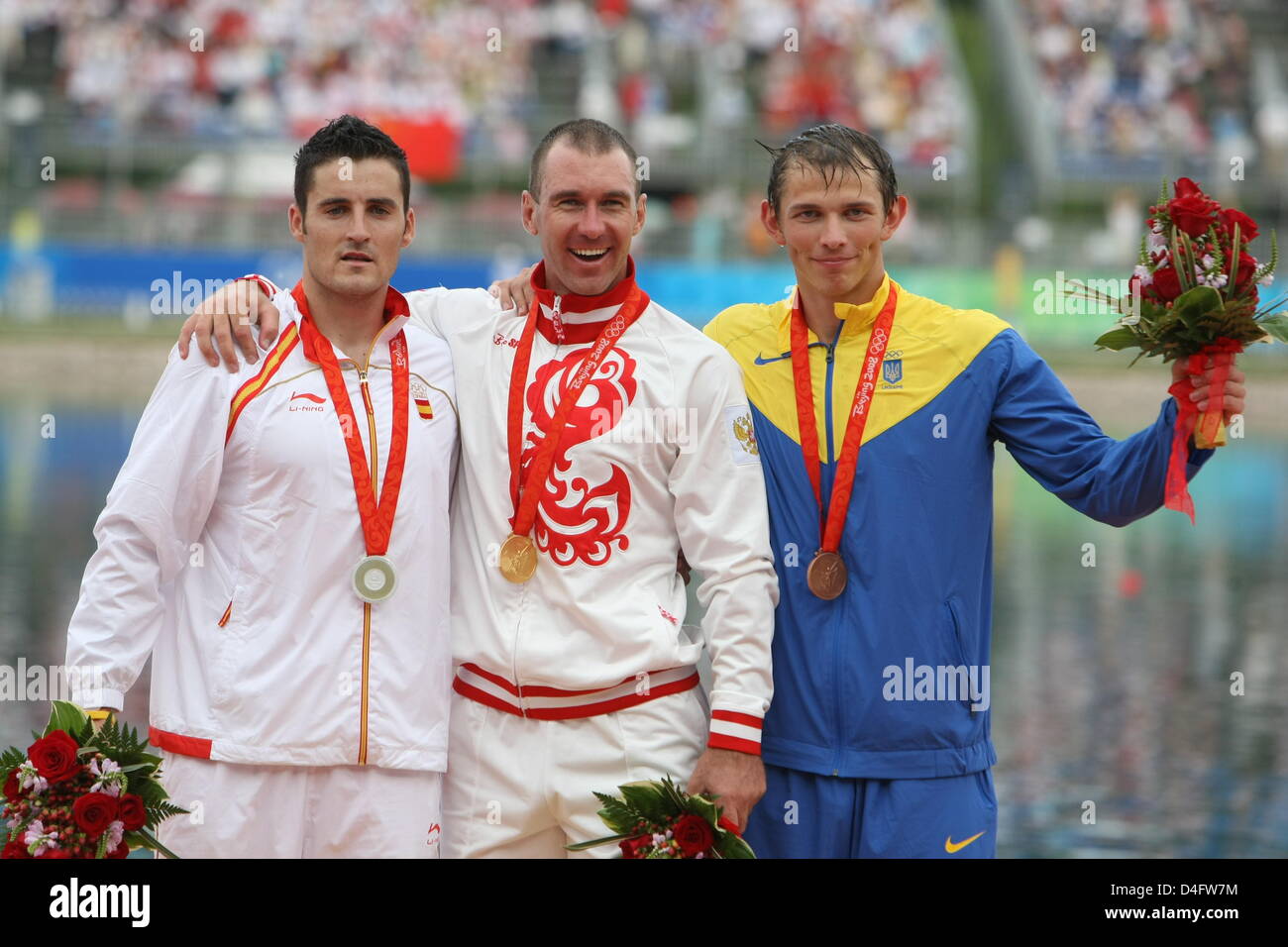 (L-R) Silver medalist David Cal of Spain, gold medalist Maxim Opalev of ...