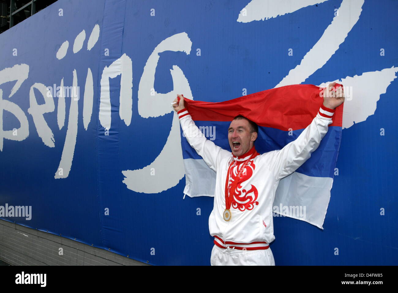 Maxim Opalev of Russia celebrates his Gold Medal after the Canoe Single ...