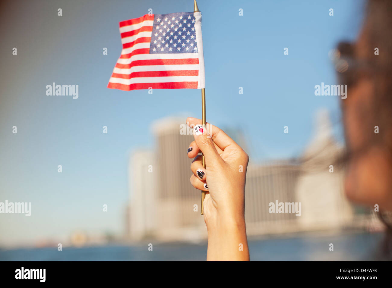 Hand waving american flag hi-res stock photography and images - Alamy