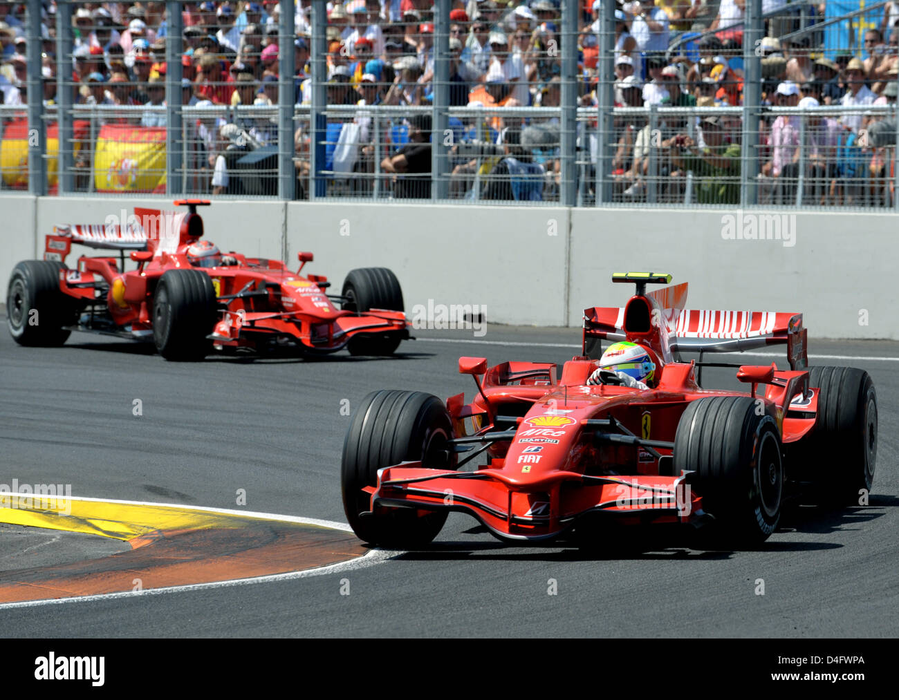 Brazilian Formula One driver Felipe Massa (R) of Ferrari leads his ...
