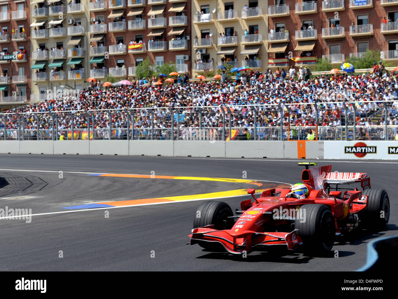 Brazilian Formula One driver Felipe Massa steers his Ferrari to win the ...